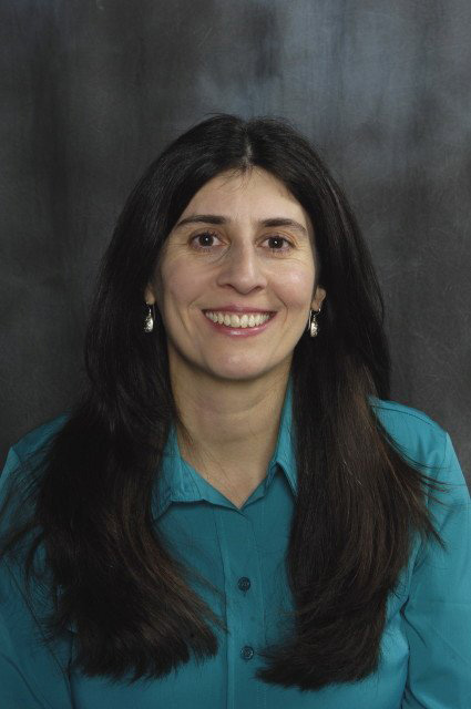 Dr. Thecla Damianakis